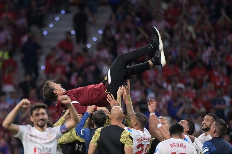 Sevilla draw with Atletico to secure Champions League qualification